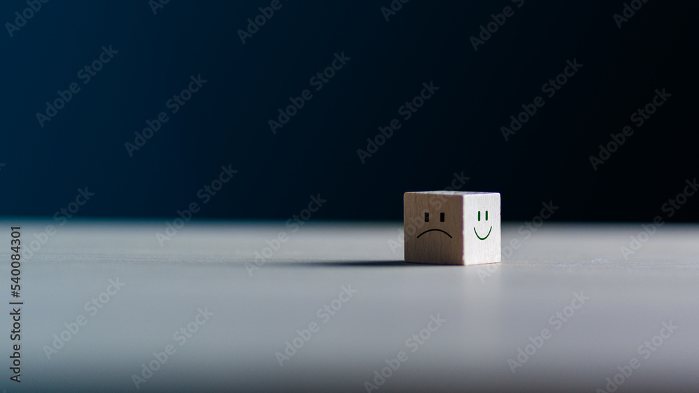 Customer service evaluation concept. The wooden block had a bright ...