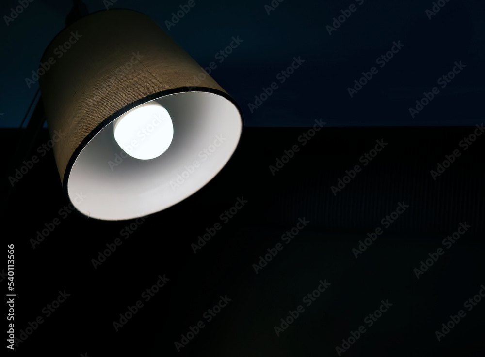 Illuminated Fabric Table Lamp against darkness, lamp in the dark, cool ...