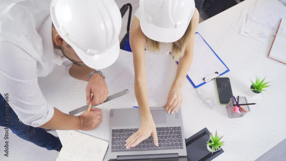 Engineers draw projects, architecture, drawings with a ruler. Male ...