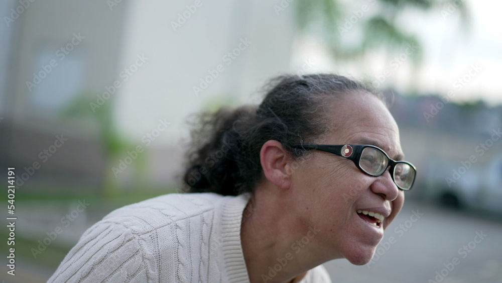 One happy senior woman laughing and smiling. South American hispanic ...