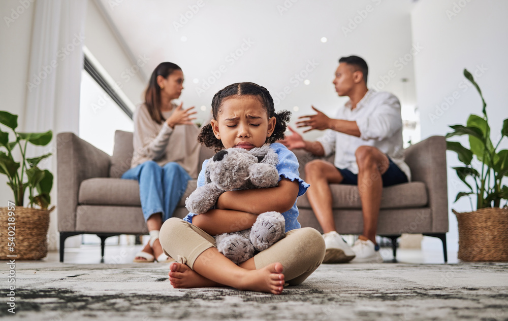 Parents, fighting and sad girl in living room with teddy bear for ...