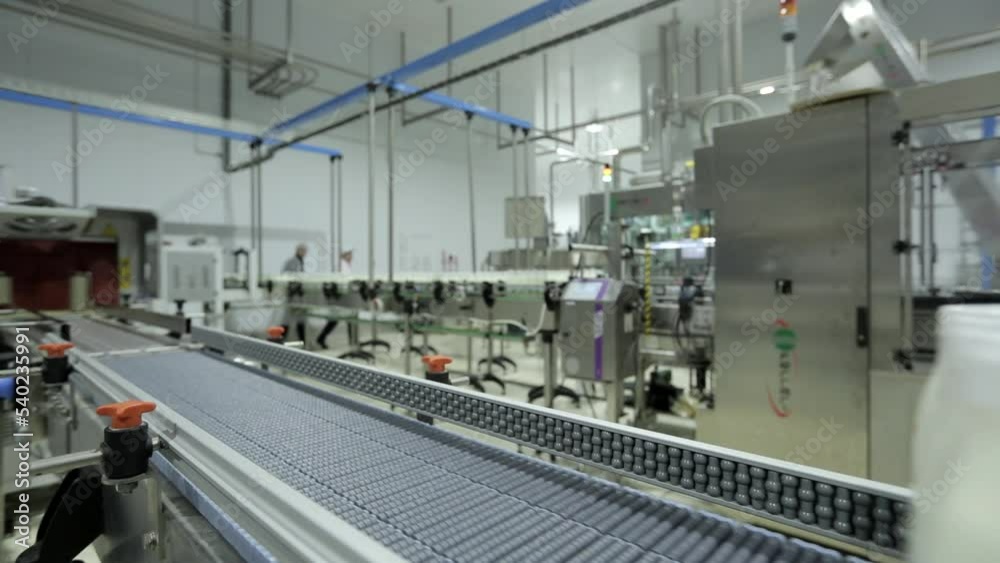 Conveyor Package distribution mechanism at industrial factory. Conveyor ...