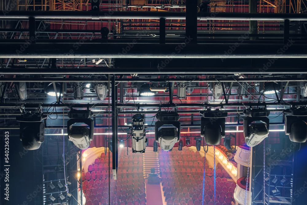 Technical equipment at the backstage of theater. Stage spot lighting ...