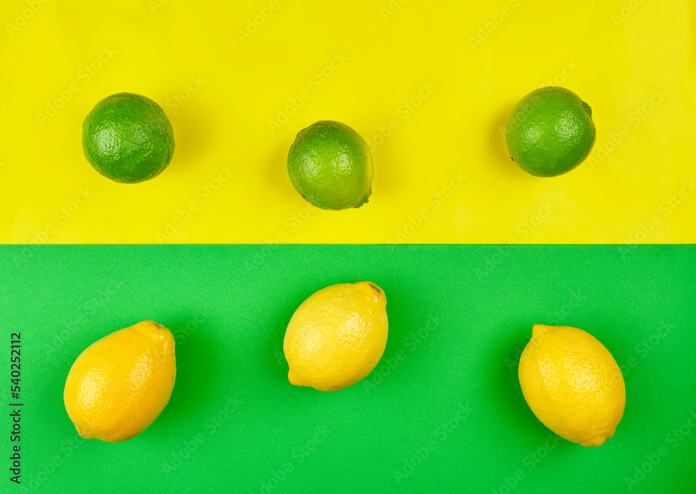 Lemons and Limes. Yellow and Green. Fresh and ripe lemons and limes on ...