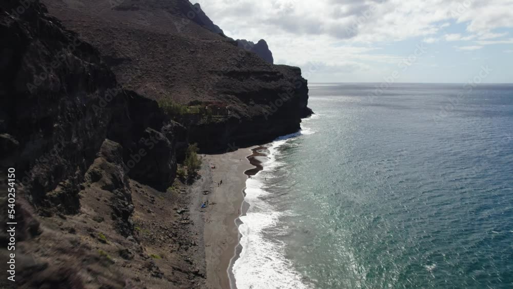 Dark sand beach Playa de Guigui in west part of the Gran Canaria island ...