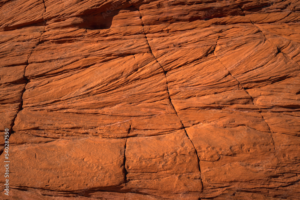 Red rock surface textures with cracks and erosion along the Church Rock ...