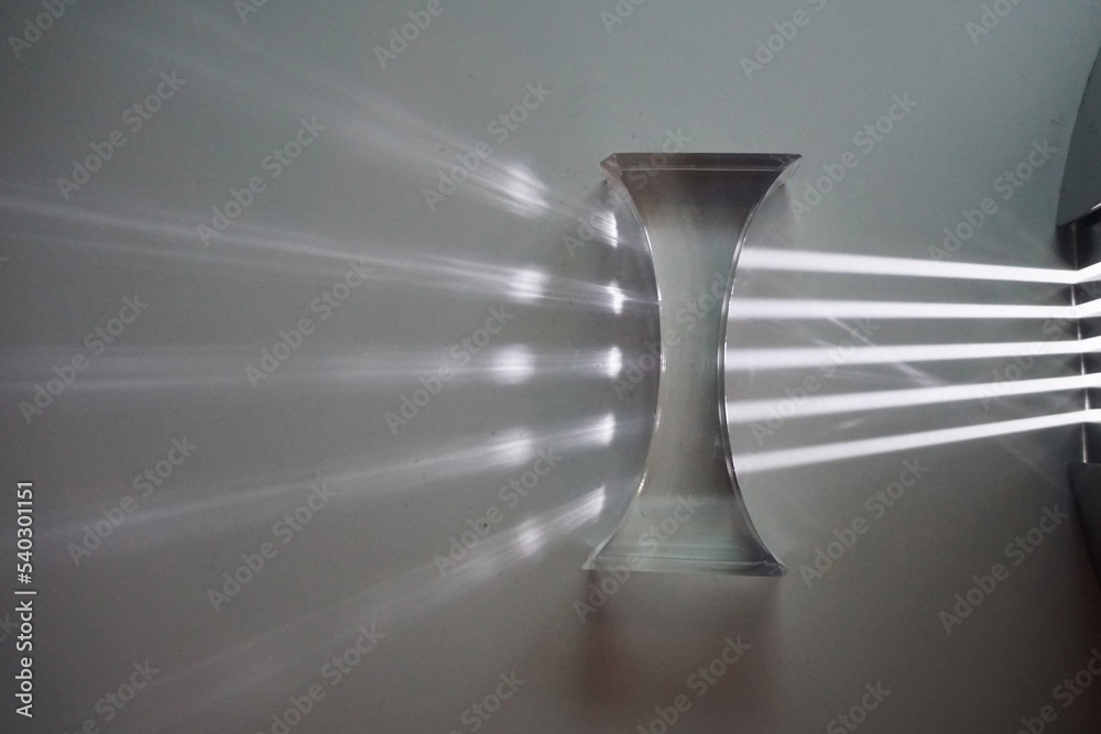 Parallel light passing through a refracted lens is refracted as if it ...