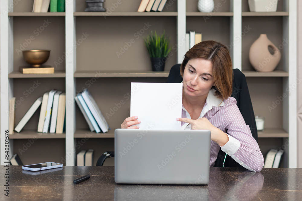 Tired frustrated and overworked business woman sitting in the office ...