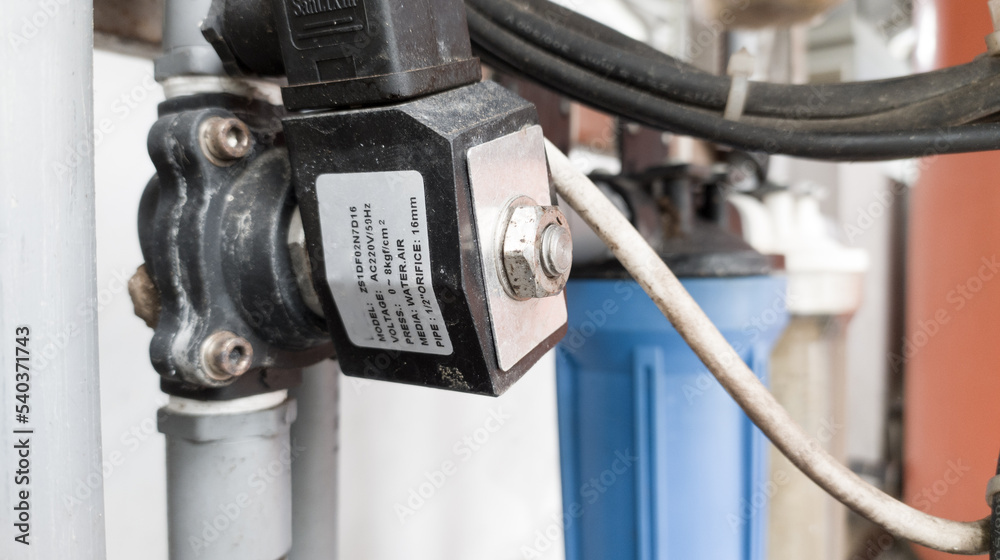 Water Solenoid valve to control water pressure lines. Stock Photo ...