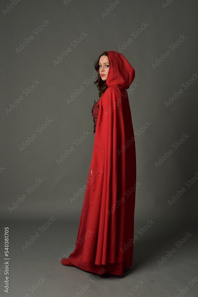 Full length portrait of woman wearing red medieval fantasy costume ...