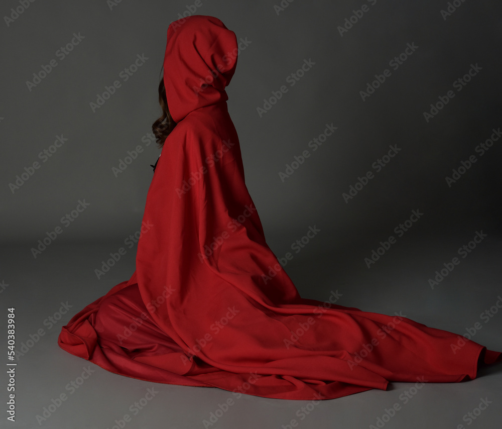 Full length portrait of beautiful brunette woman wearing red medieval ...