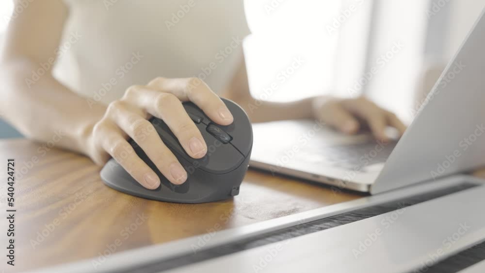 woman hand using computer ergonomic mouse, prevention wrist pain ...