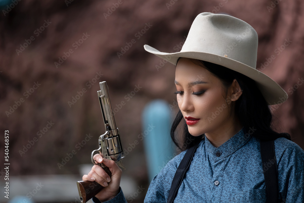 Foto de vintage style portraits of a cowboy girl on the farm do Stock ...