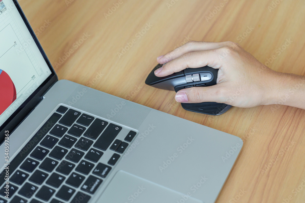 woman hand using ergonomic vertical mouse during working on Adjustable ...
