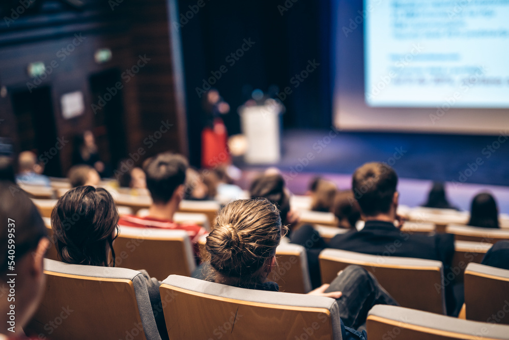 Woman giving presentation on business conference event. Stock Photo ...