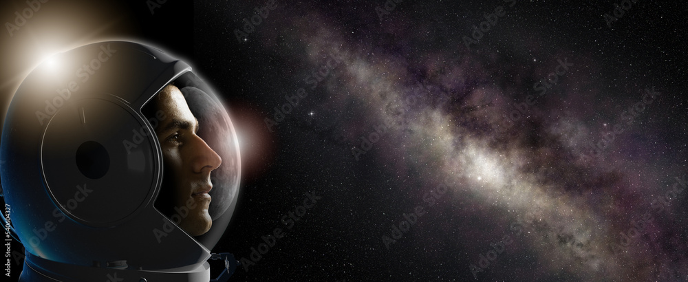 Head shot of astronaut wearing a helmet in outer space looking at the ...