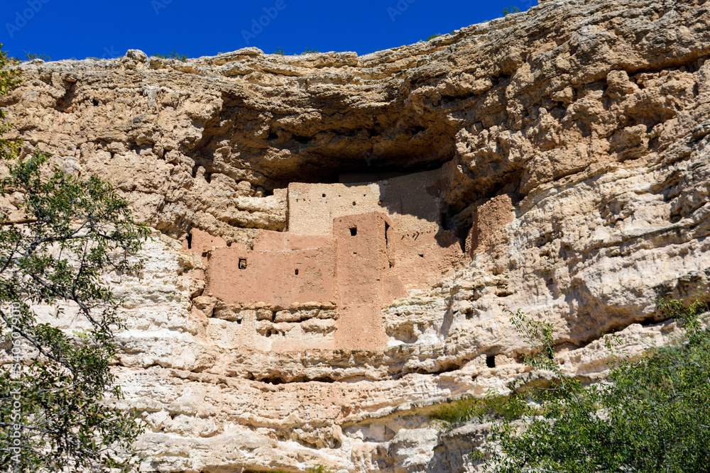 Montezuma Castle old rock dwellings up a sheer limestone cliff. Ancient ...