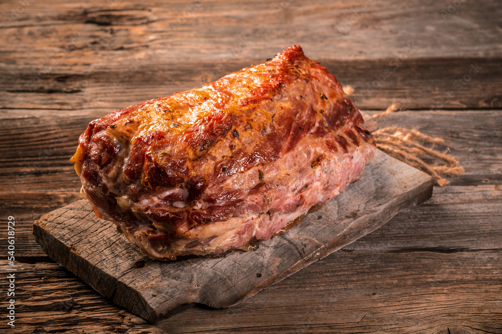 Poster Delicious artisanal whole smoked slab bacon on a cutting block ...
