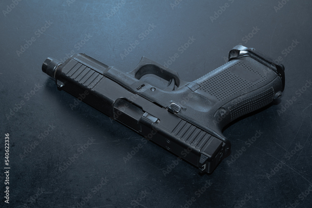 9mm pistol with a threaded barrel, close-up photo. Stock Photo | Adobe ...