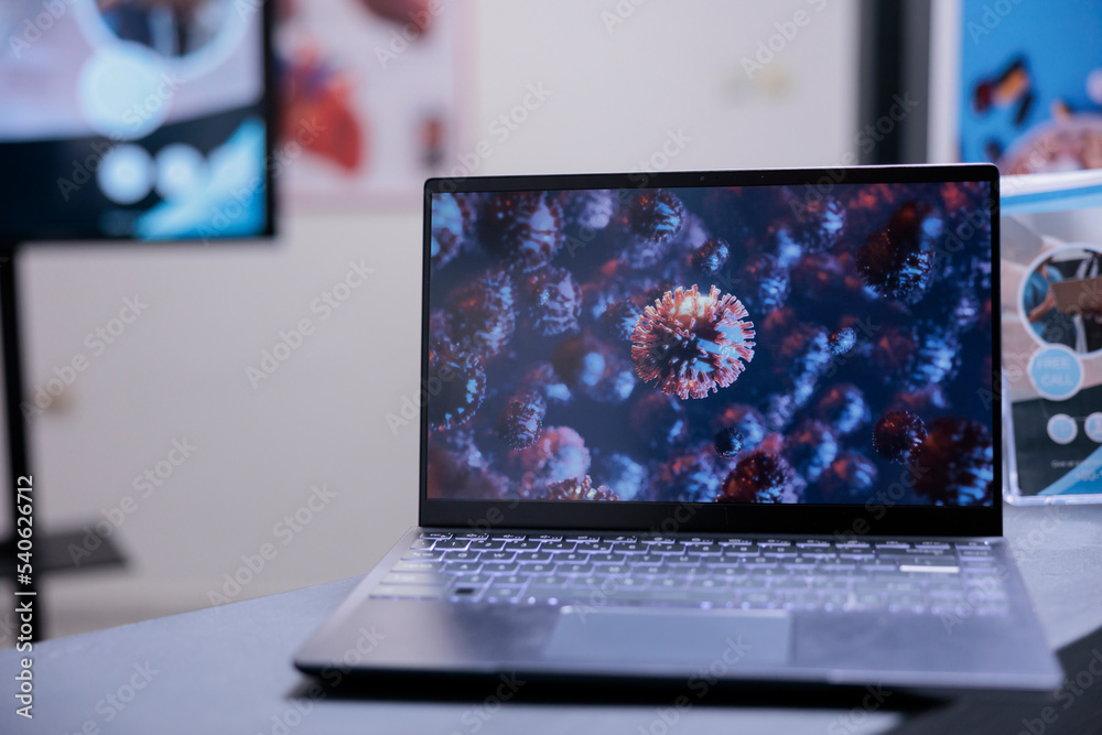Close up of computer screen showing microscopic images of virus ...