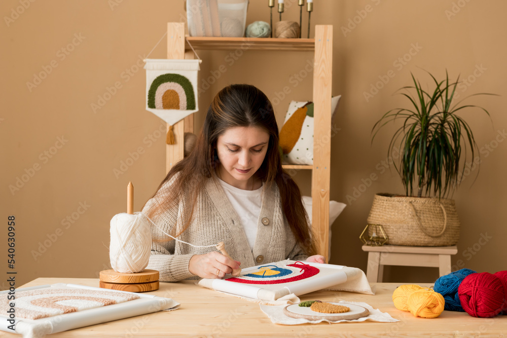 Trending crafts concept. Woman creating a handmade decoration for home ...
