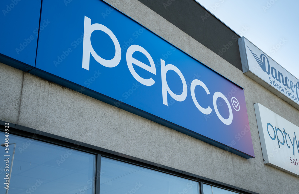 Pepco store with brand logo sign board hanging above entrance door ...