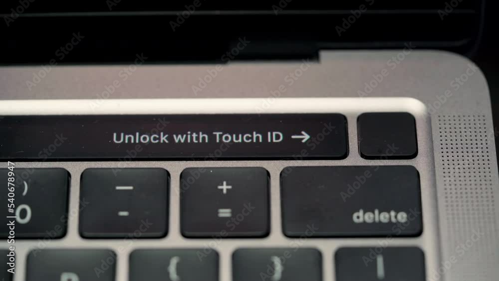 Close up footage of unlock with touch id animation text guide display ...