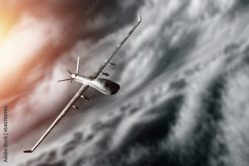 A military combat drone UAV is on duty in the sky. Modern aircraft ...