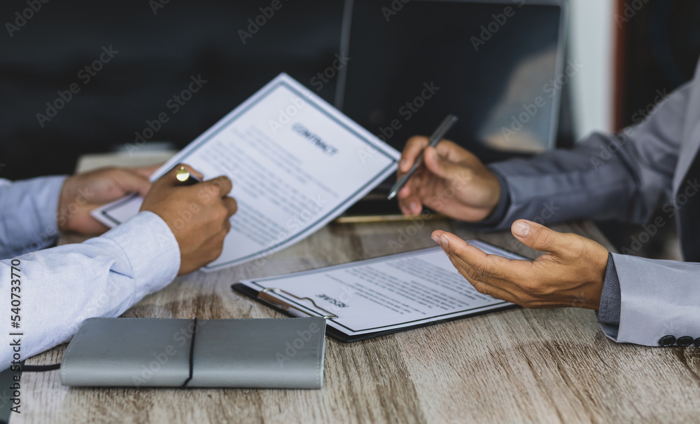 Job interview and signing of employment contract documents. Stock Photo ...