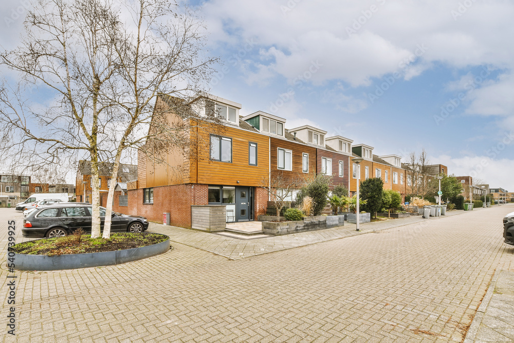 Facade of residential house with parking lot Stock Photo | Adobe Stock