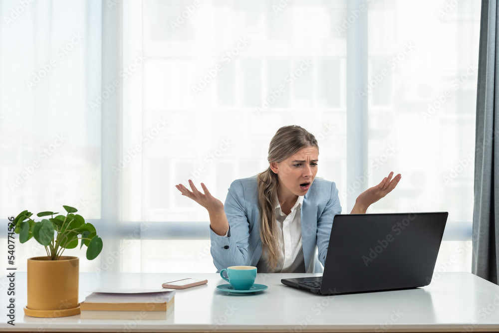 Young frustrated business woman office worker trying to concentrate for ...