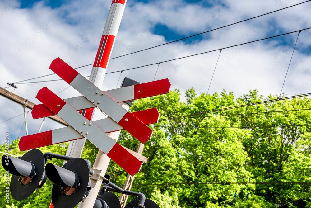 Red and white railroad crossing sign with warning lights Stock Photo ...