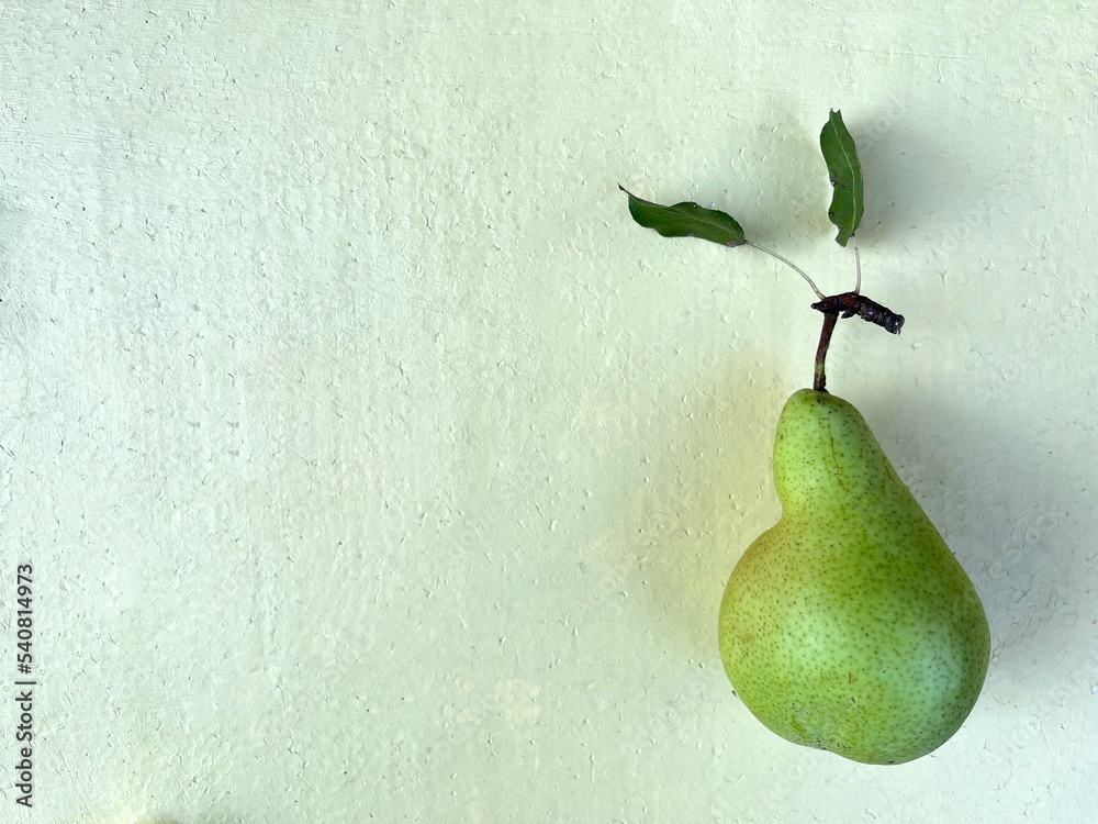 background for text with a photo of a green pear. For your harvest. For ...