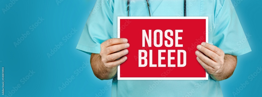 Nosebleed (epistaxis). Doctor shows red sign with medical word on it ...