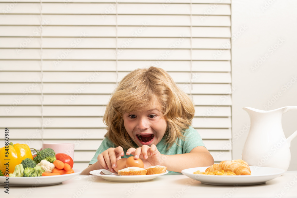 Portrait of preteen child eat fresh healthy food in kitchen at home ...