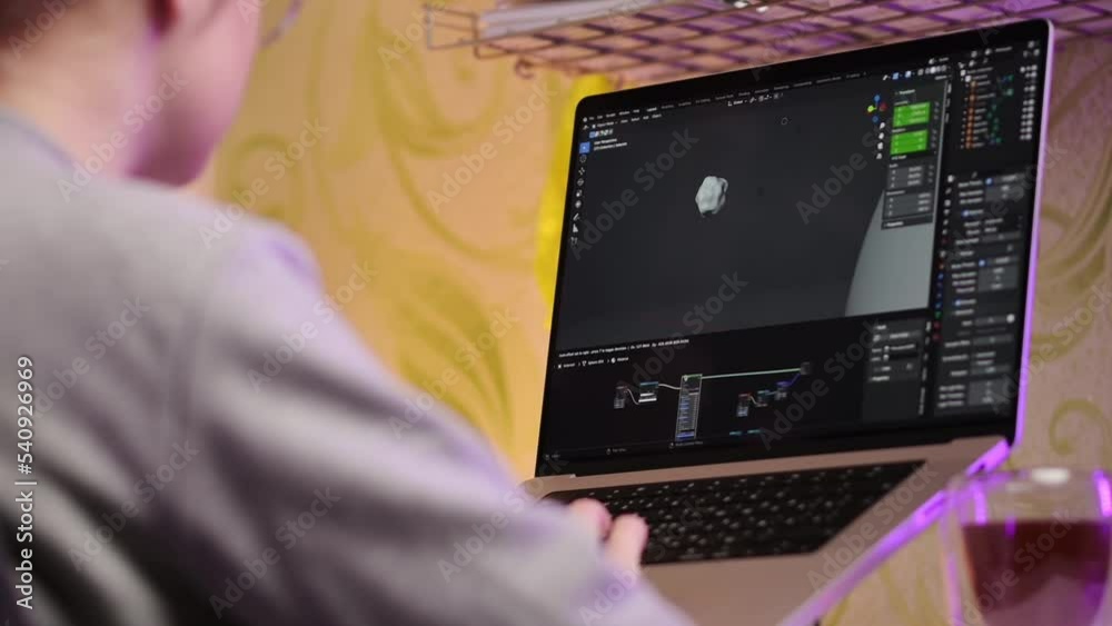 Skillful female designer turning 3d model while working on new video ...