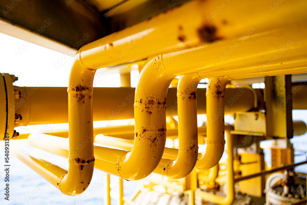 Steel pipe with blister paint, rust paint peeling off against the ...