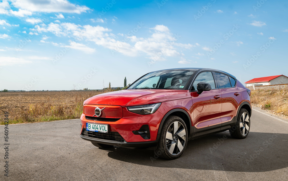2022 Volvo C40 in Fusion Red Stock Photo | Adobe Stock