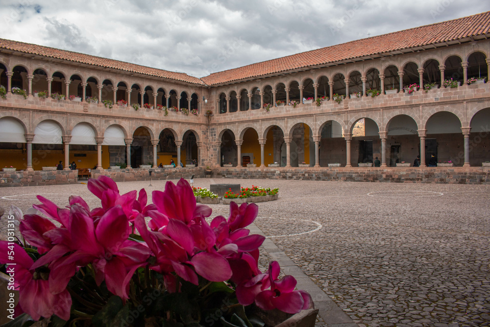 Inner courtyard, with a view of the corridors with arches and columns ...