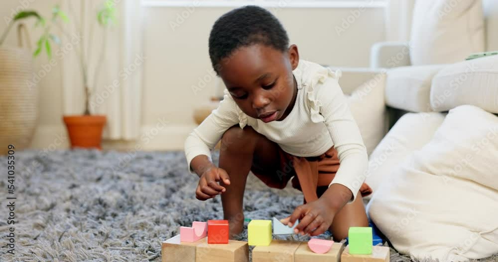 Black girl, building blocks and creative learning in family home lounge ...