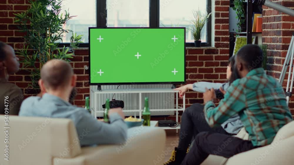 Group of people using greenscreen template to play video games, having ...