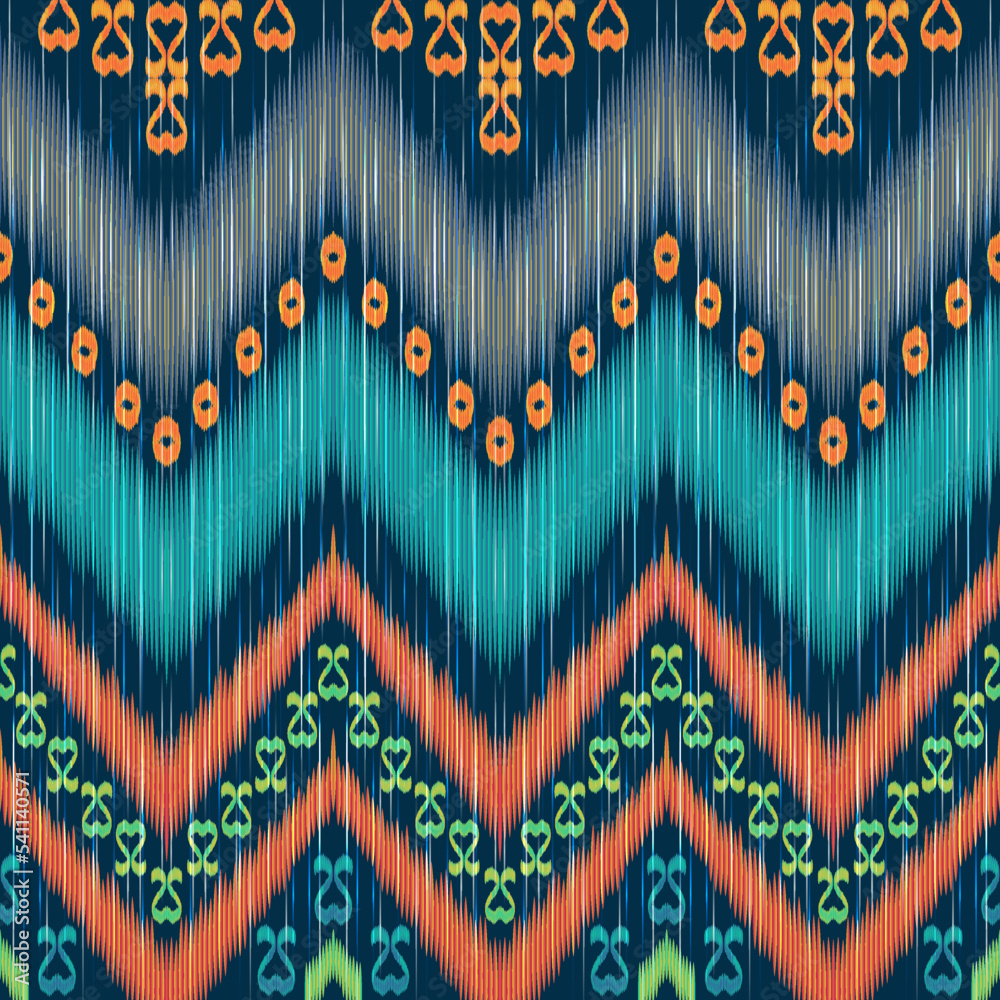 Ikat ethnic pattern. Dark blue, orange and green glow colors ...