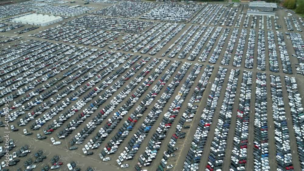 Many cars on a parking lot from above, filmed with a drone in 4k. high ...
