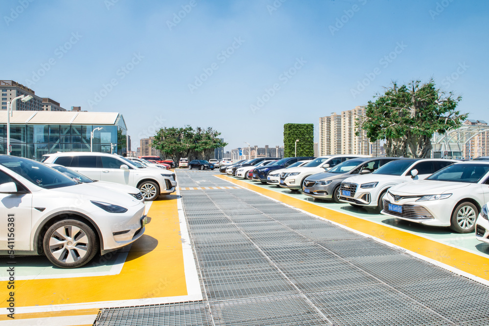 Outdoor parking lot with modern buildings and sky background. Stock-Foto | Adobe Stock