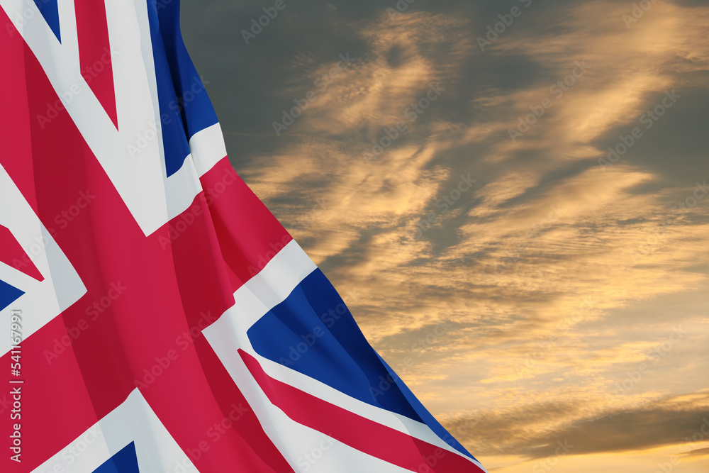 National flags of United Kingdom on sunset sky background. Background ...