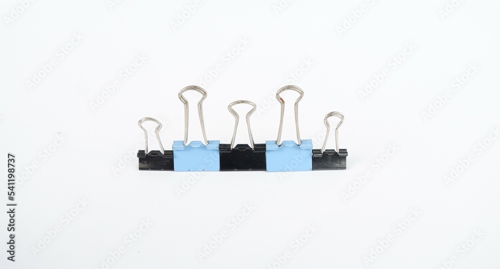 A binder clip is a strip of spring steel bent into the shape of an ...