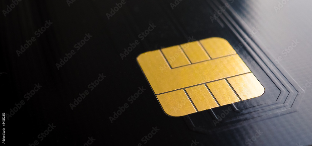 Selective focus on the electronic chip of a credit or debit card ...