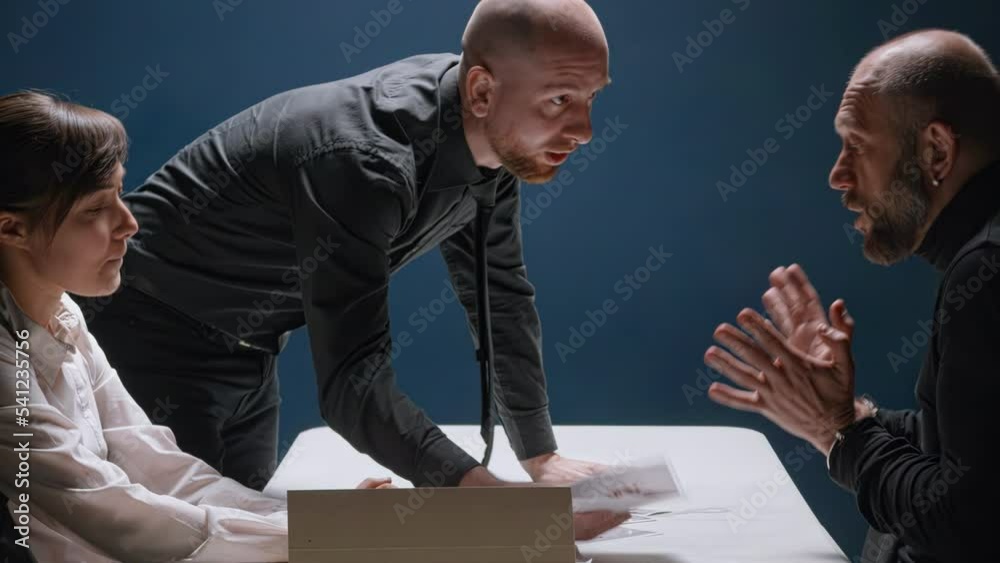 Police detective abruptly stands up, slams fist on table and shouts at ...