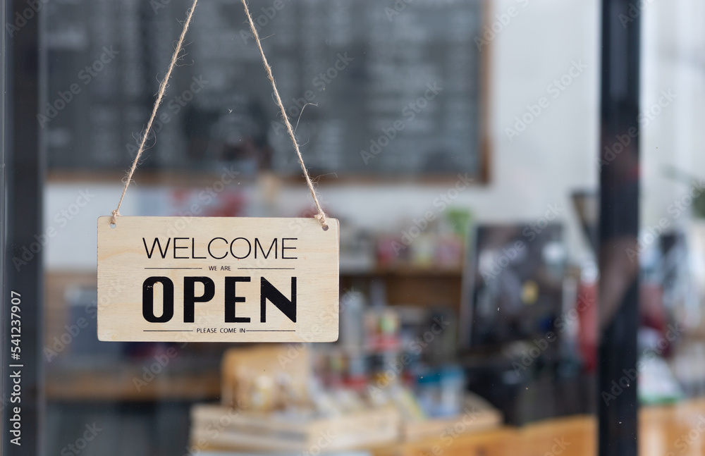 Fotografia do Stock: Open sign on the glass door, barista, waitress ...