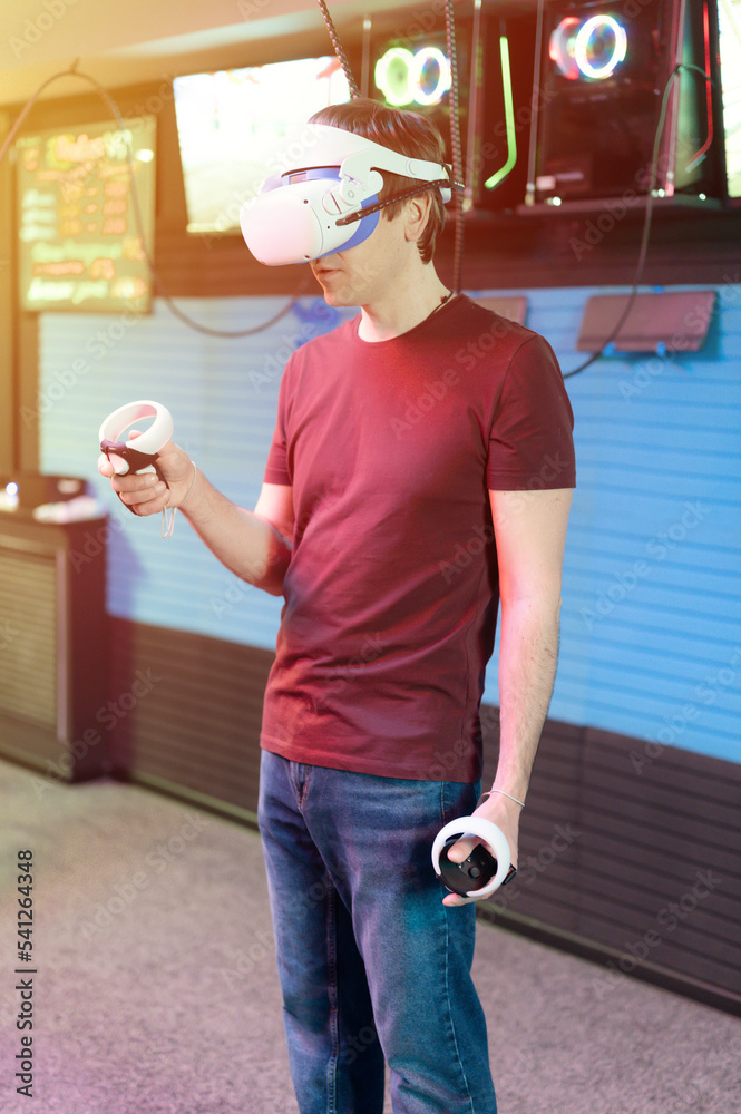 vr game and virtual reality. man gamer fun playing on futuristic ...